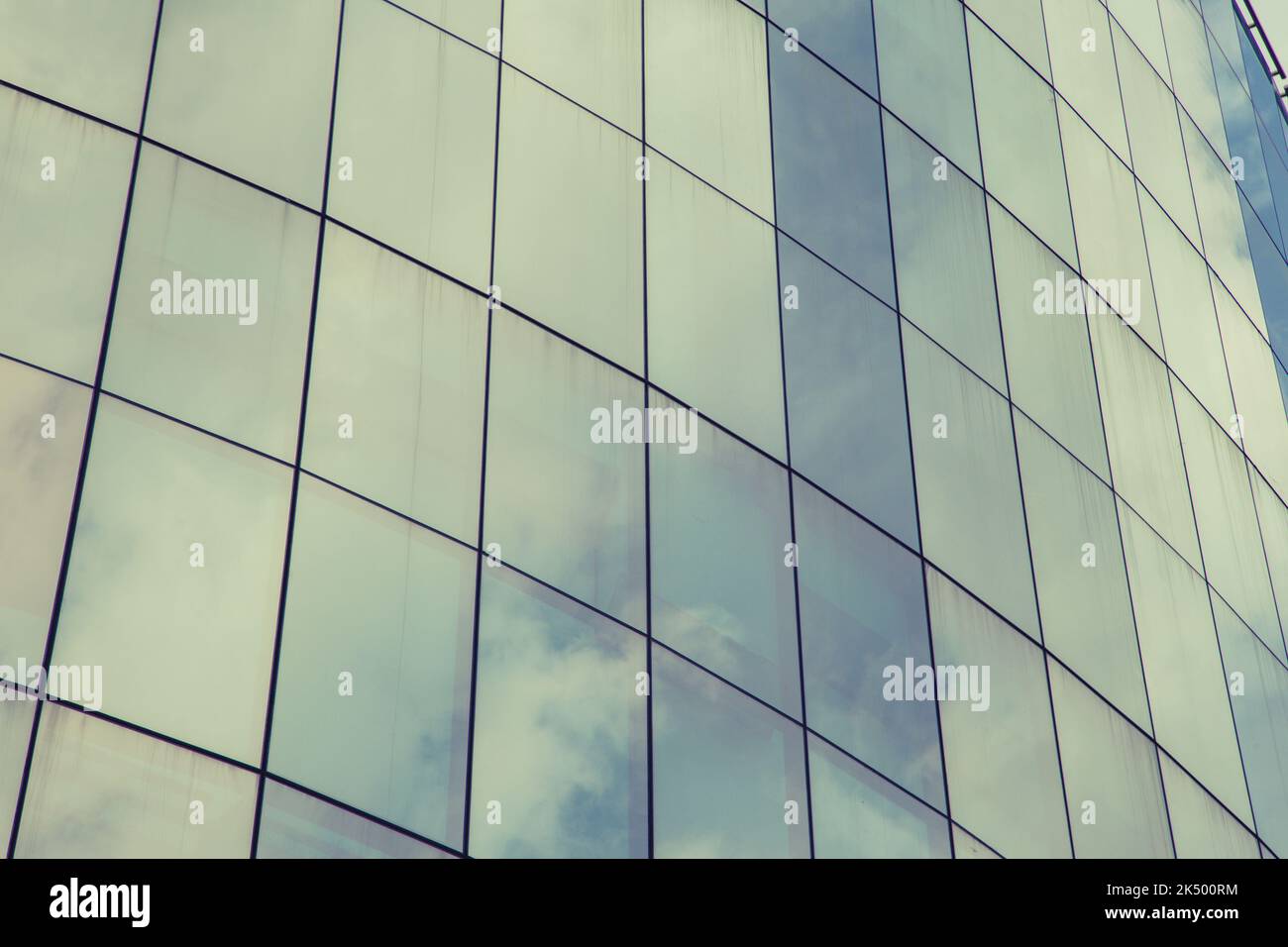 Blue glass of windows building background Stock Photo - Alamy