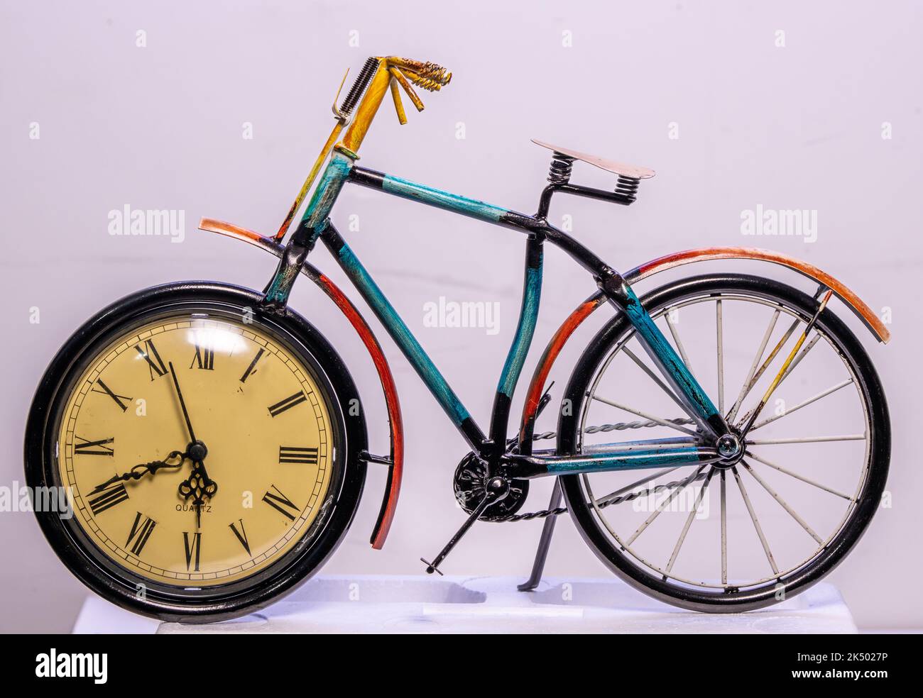 Bike with clock hi-res stock photography and images - Alamy