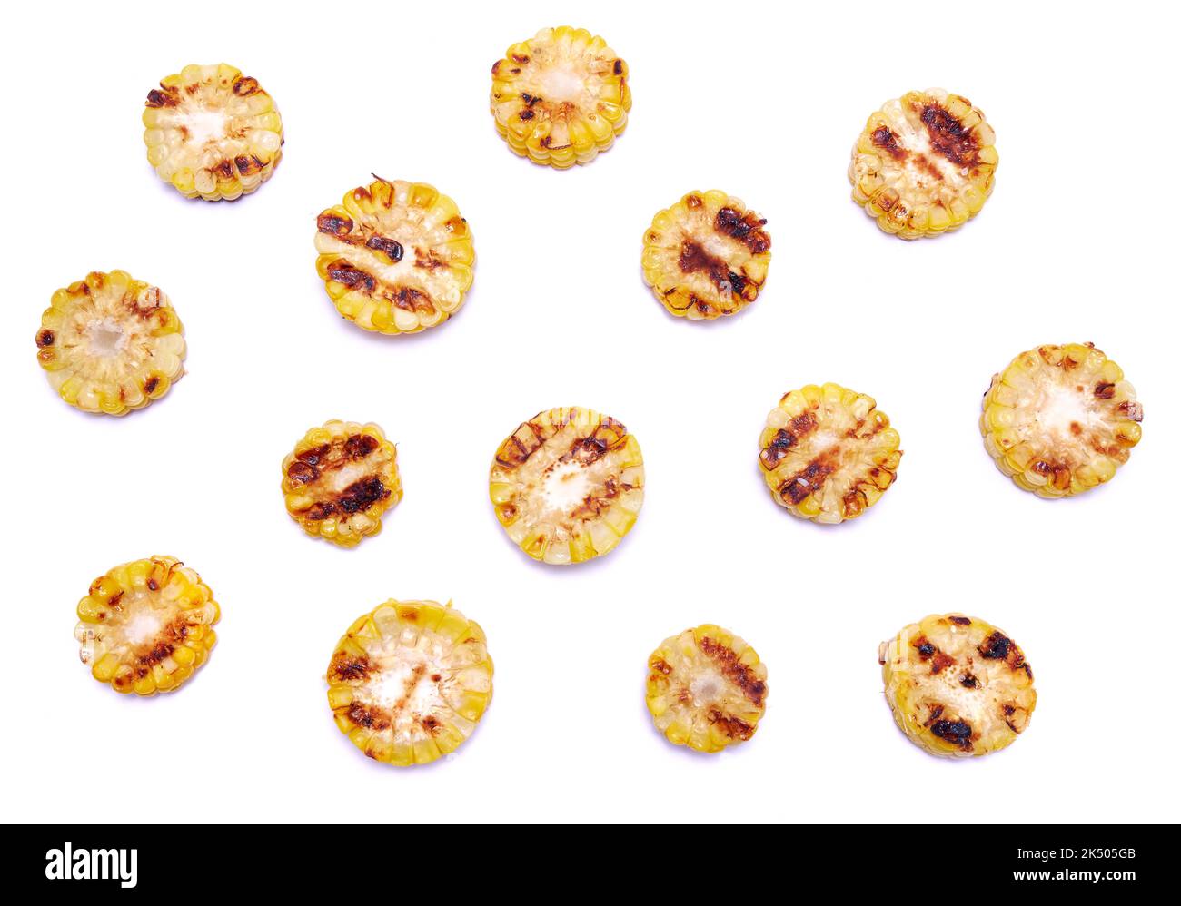 Grilled Slices of corn cobs with stripes from a grill isolated on white ...