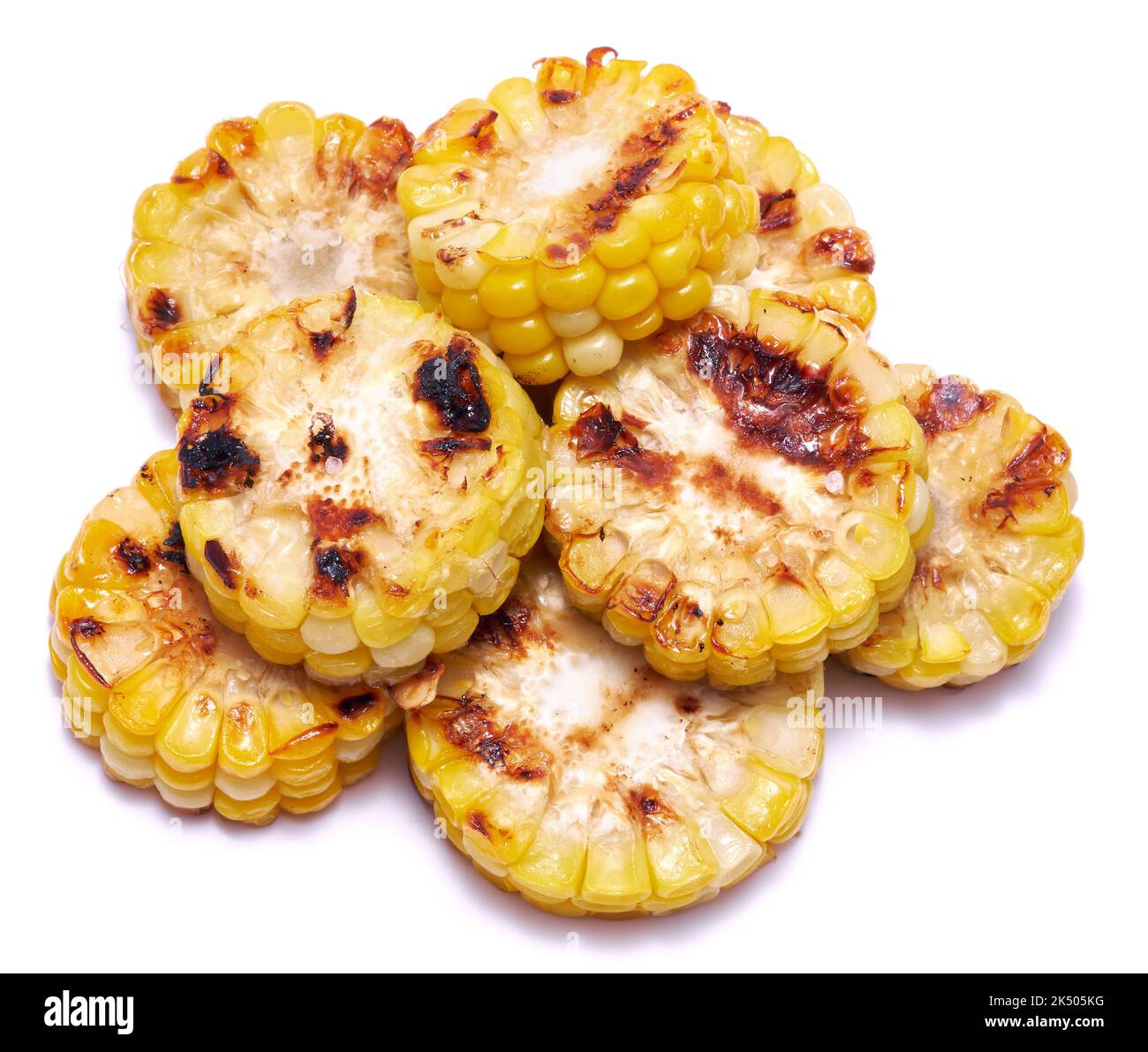 Grilled Slices of corn cobs with stripes from a grill isolated on white ...