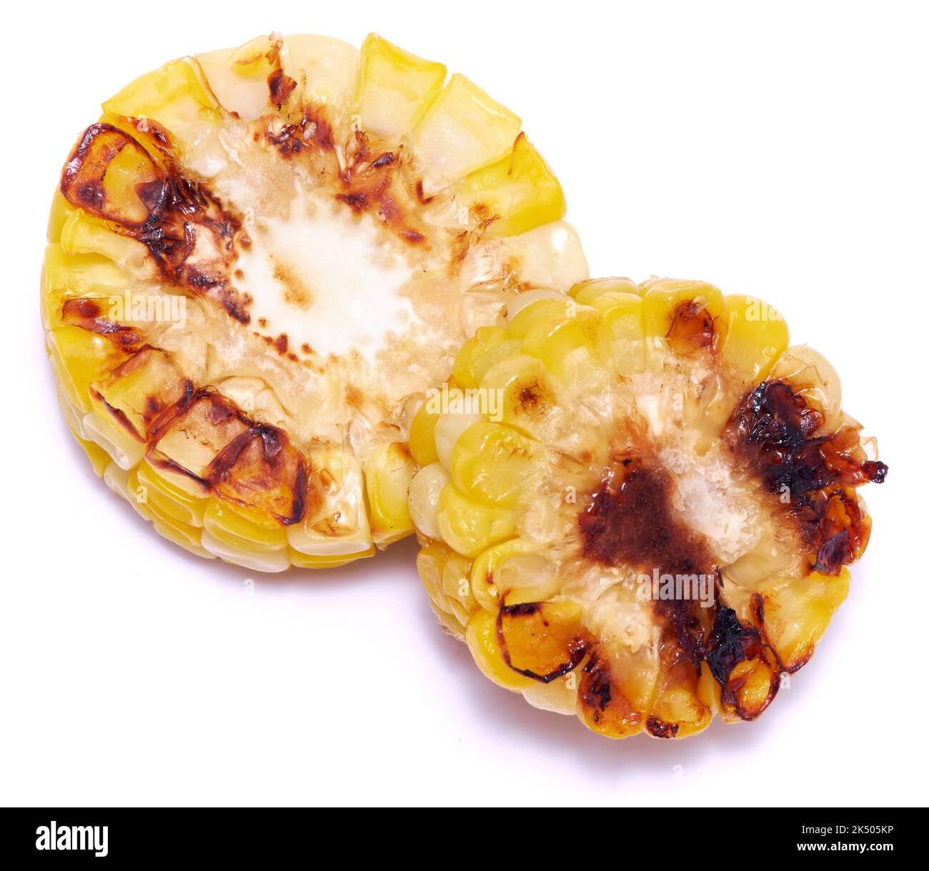 Grilled Slices of corn cobs with stripes from a grill isolated on white ...