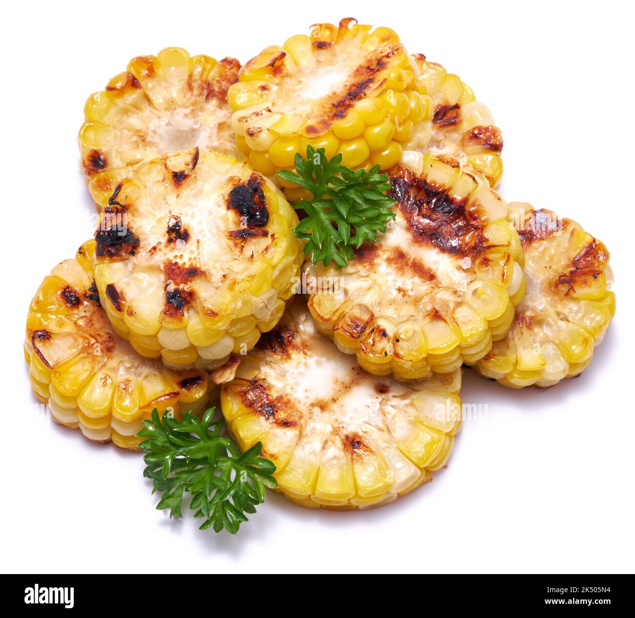 Grilled Slices of corn cobs with stripes from a grill isolated on white ...
