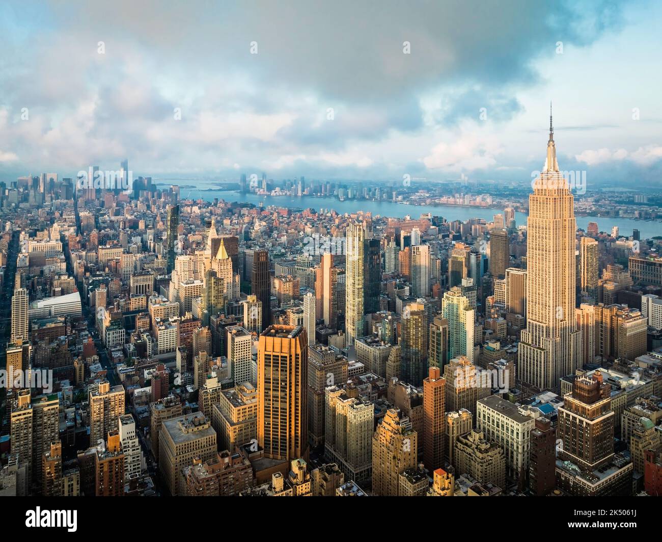 Manhattan skyscrapers at sunrise. Panoramic skyline view of New York ...