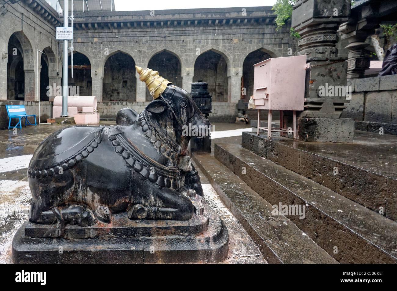 Statue of Nandi bull religious symbol in black stone at Shree ...