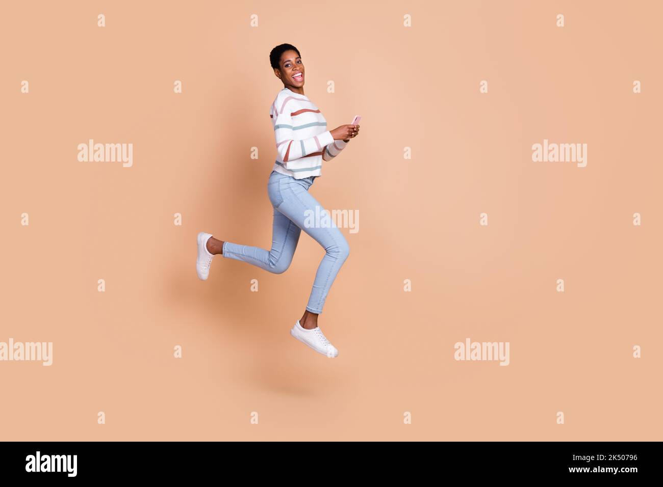 Photo of cute pretty trans human dressed pullover jumping high running ...