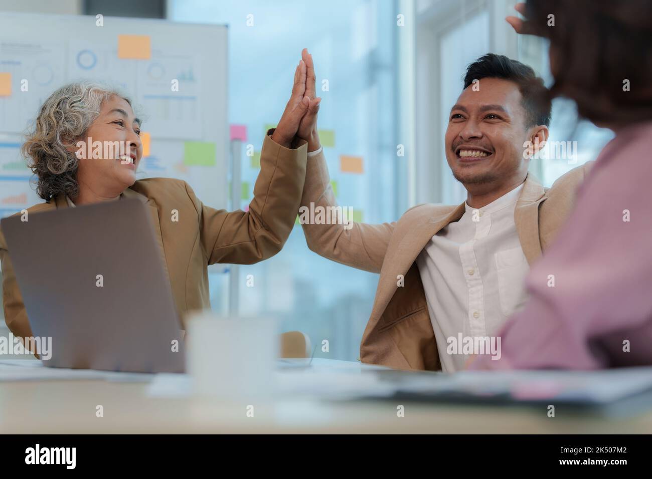 Team of successful business financial is celebrating the receiving of ...