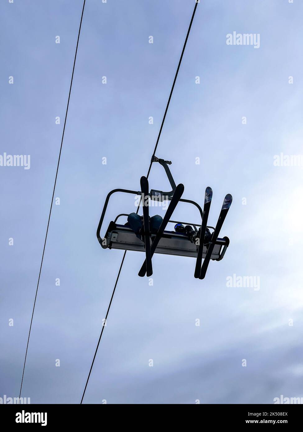 Ski Lift snowy mountain winter forest with chair lift At The Ski Resort ...