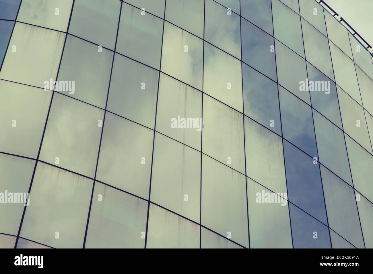 Blue glass of windows building background Stock Photo - Alamy