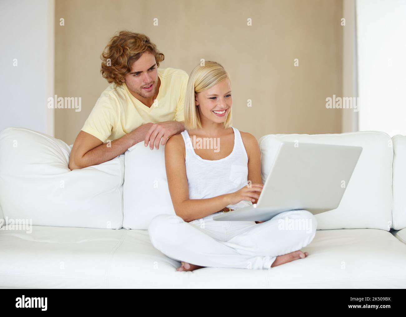 Positive blond man watching something hi-res stock photography and ...