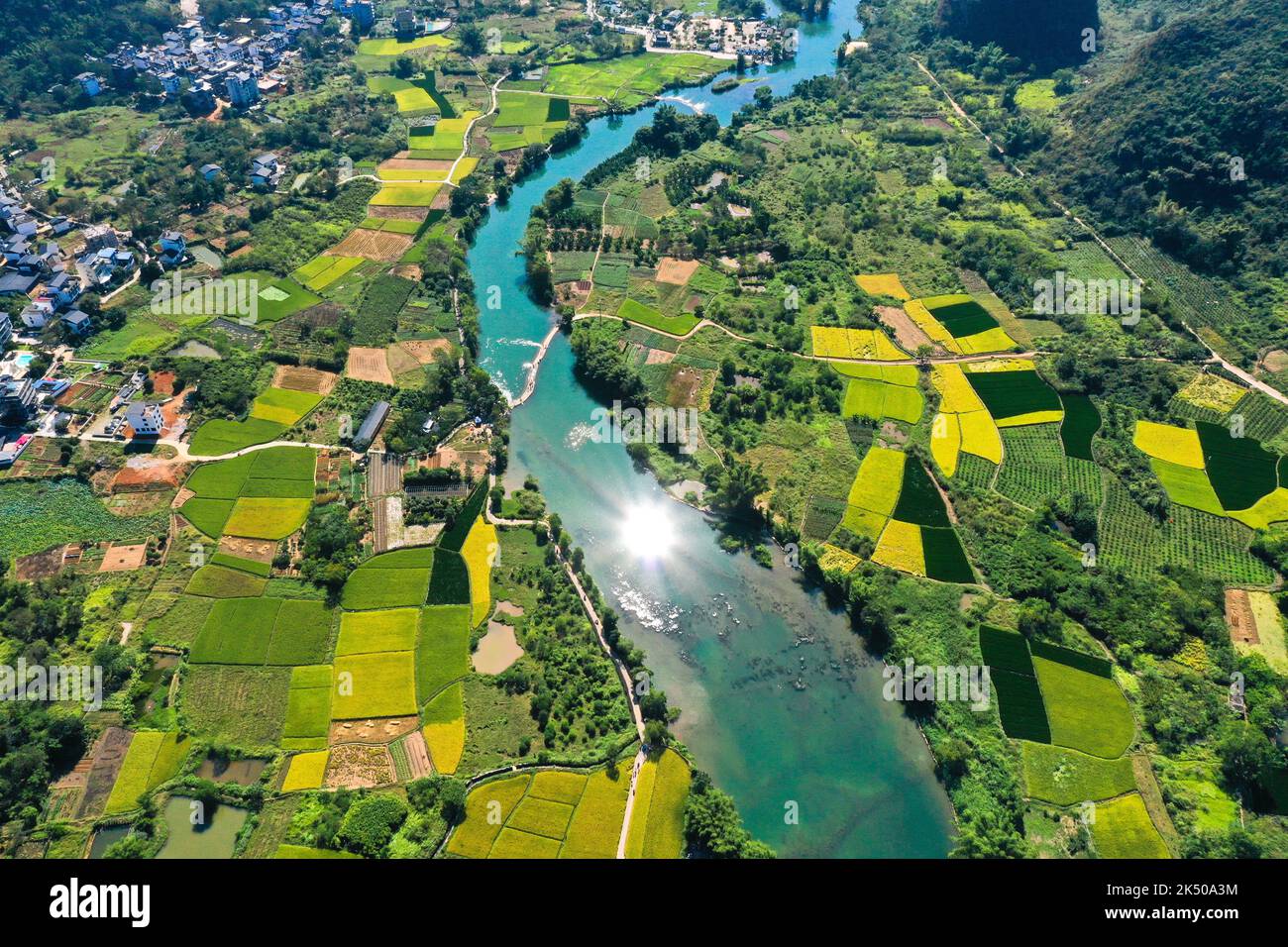 GUILIN, CHINA - OCTOBER 4, 2022 - An aerial photo shows rice ripens ...