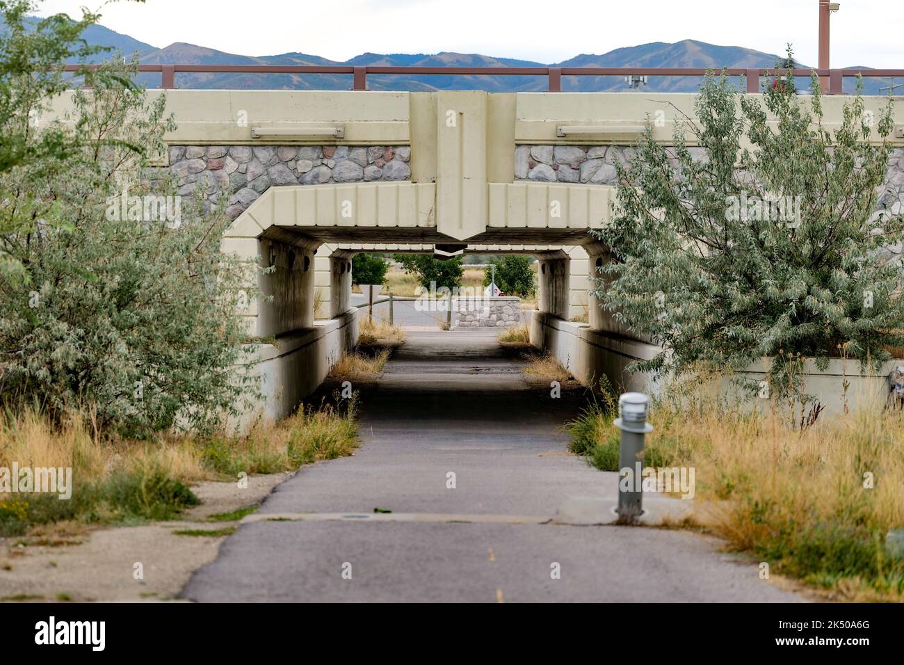 A bike path tunnel in the countryside Stock Photo - Alamy
