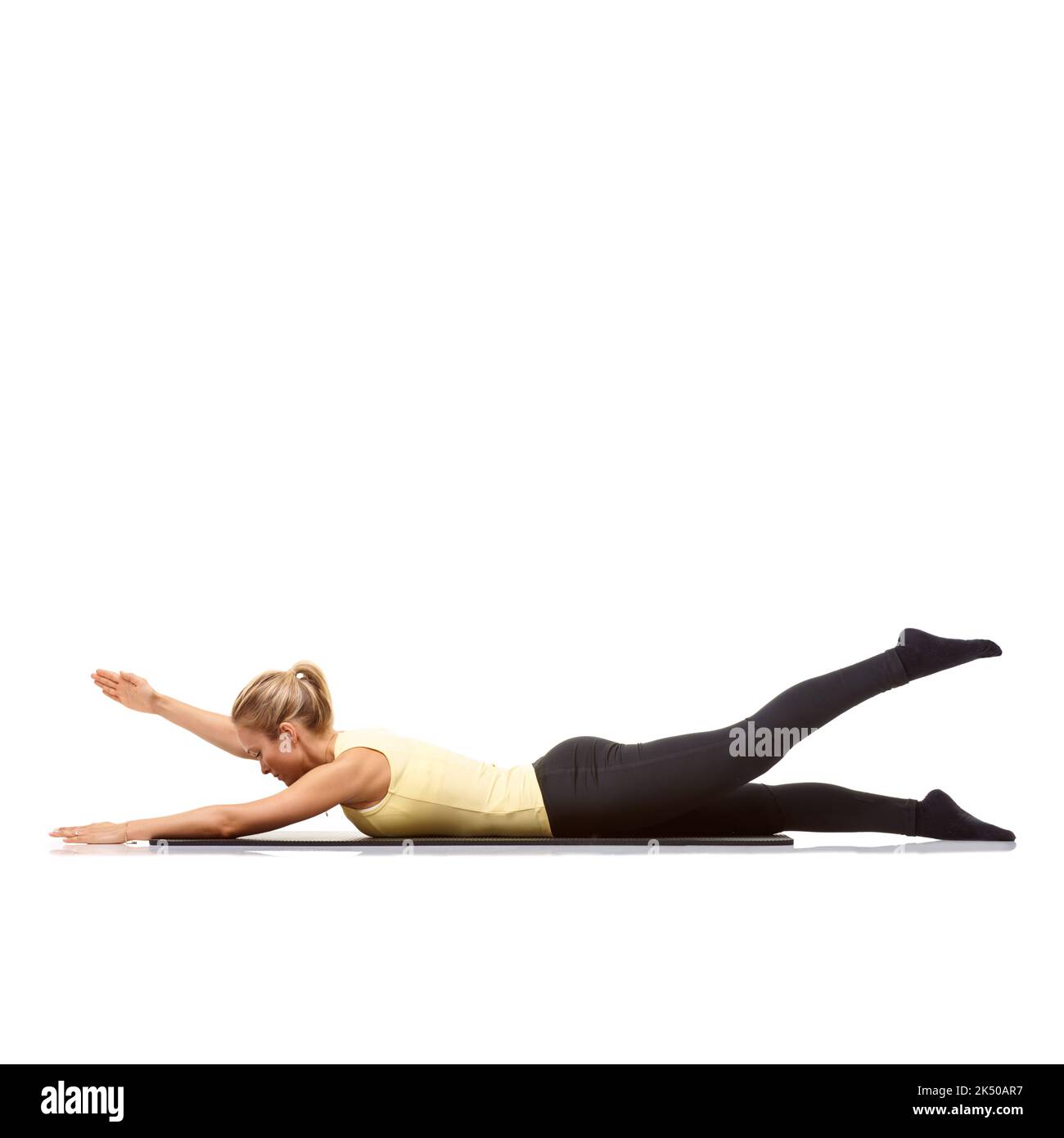 Her routine works out every part of her body. A fit young woman lying ...