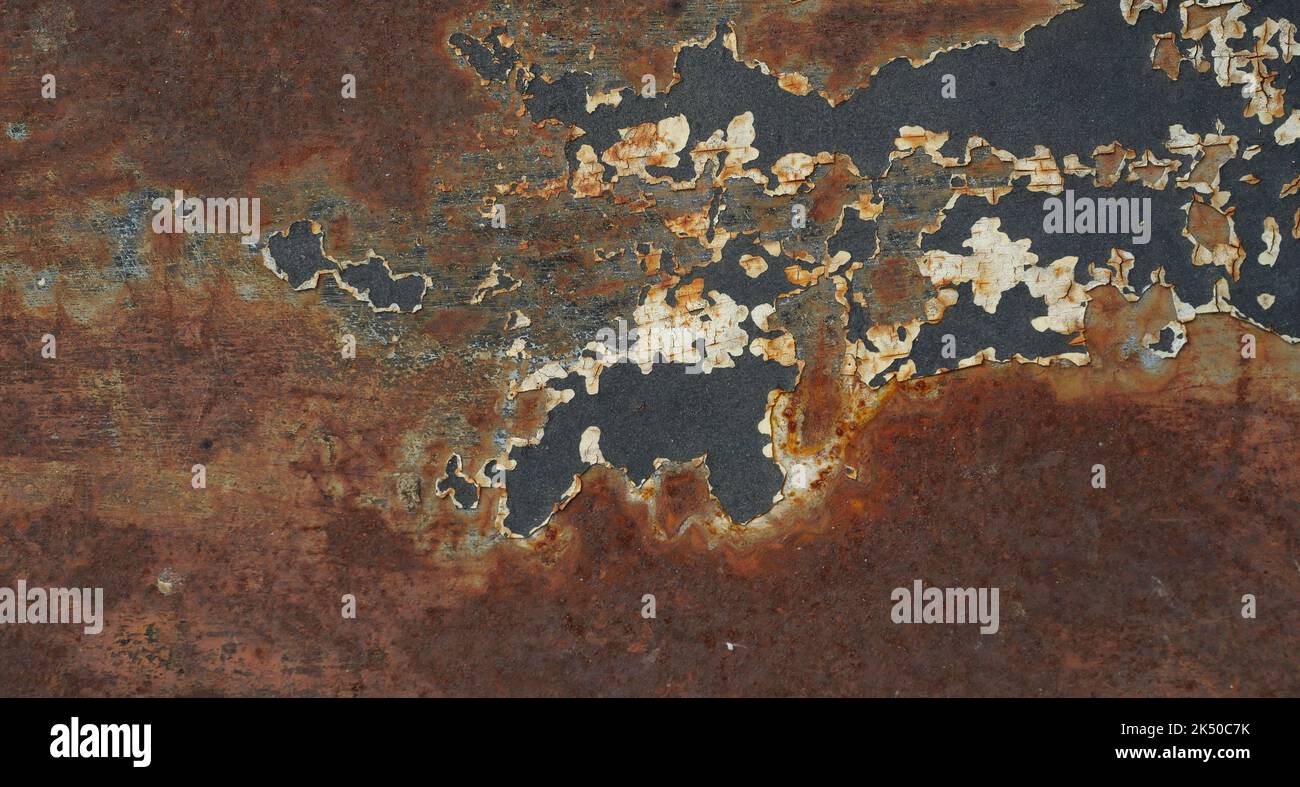 Brown rust stain on the black with blue with green with gray and silver ...