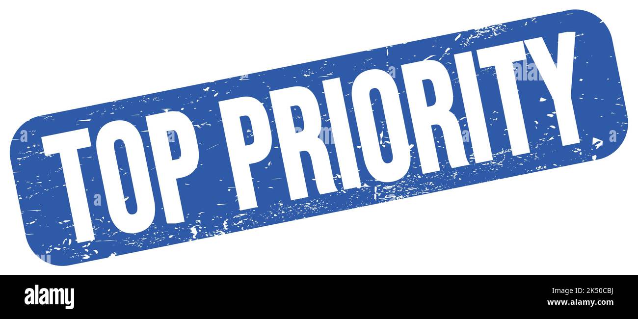 TOP PRIORITY text written on blue grungy stamp sign Stock Photo - Alamy