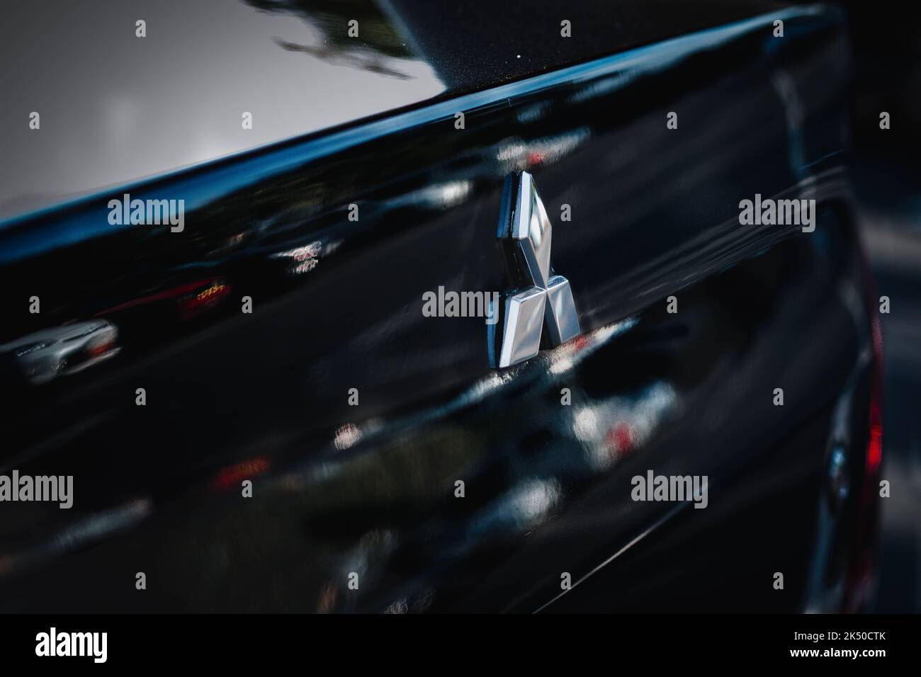 A closeup of Blue Mitsubishi Evo VII logo detail Stock Photo - Alamy