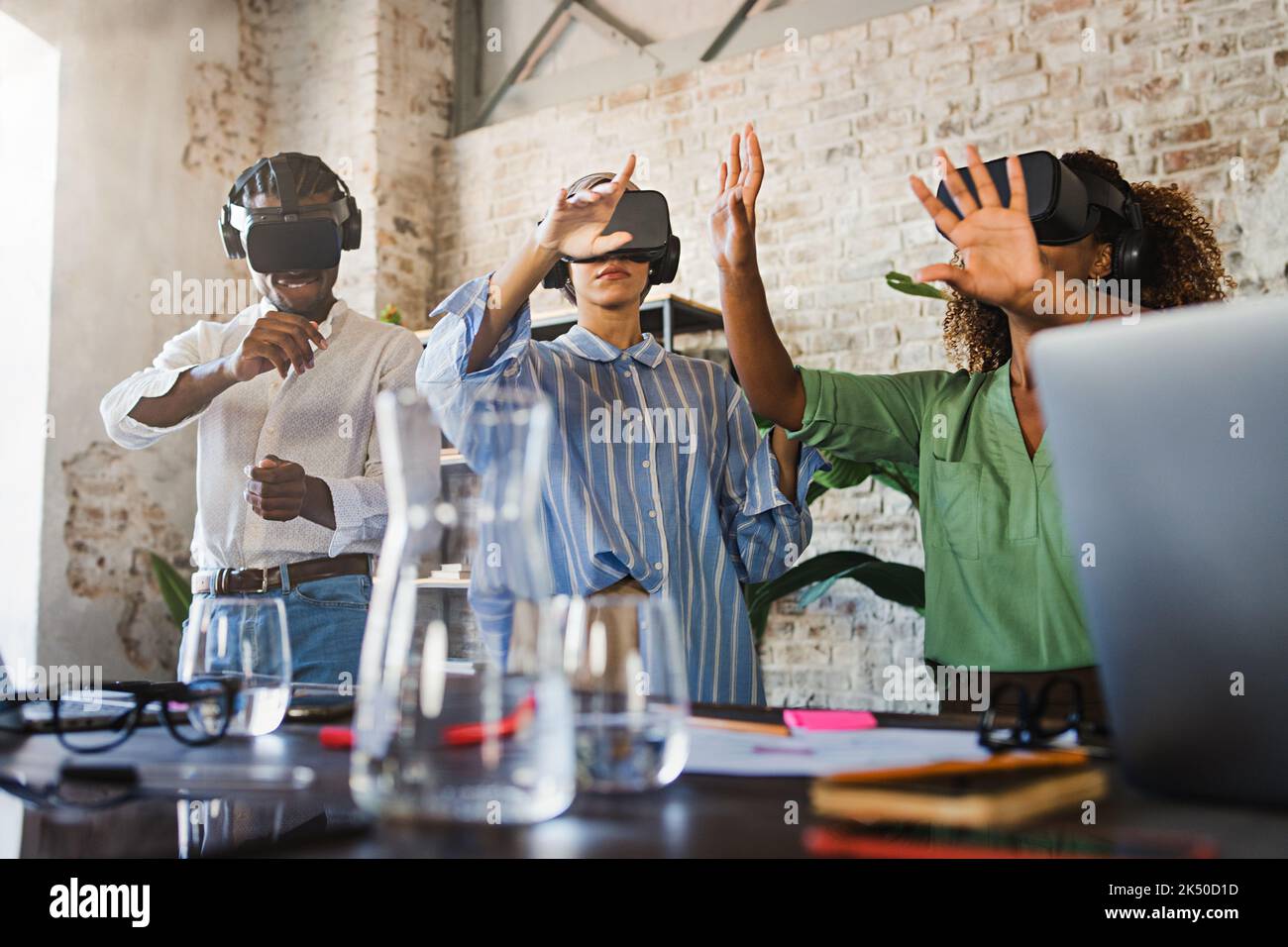 Office creative entrepreneurs having a 3d business meeting in the ...