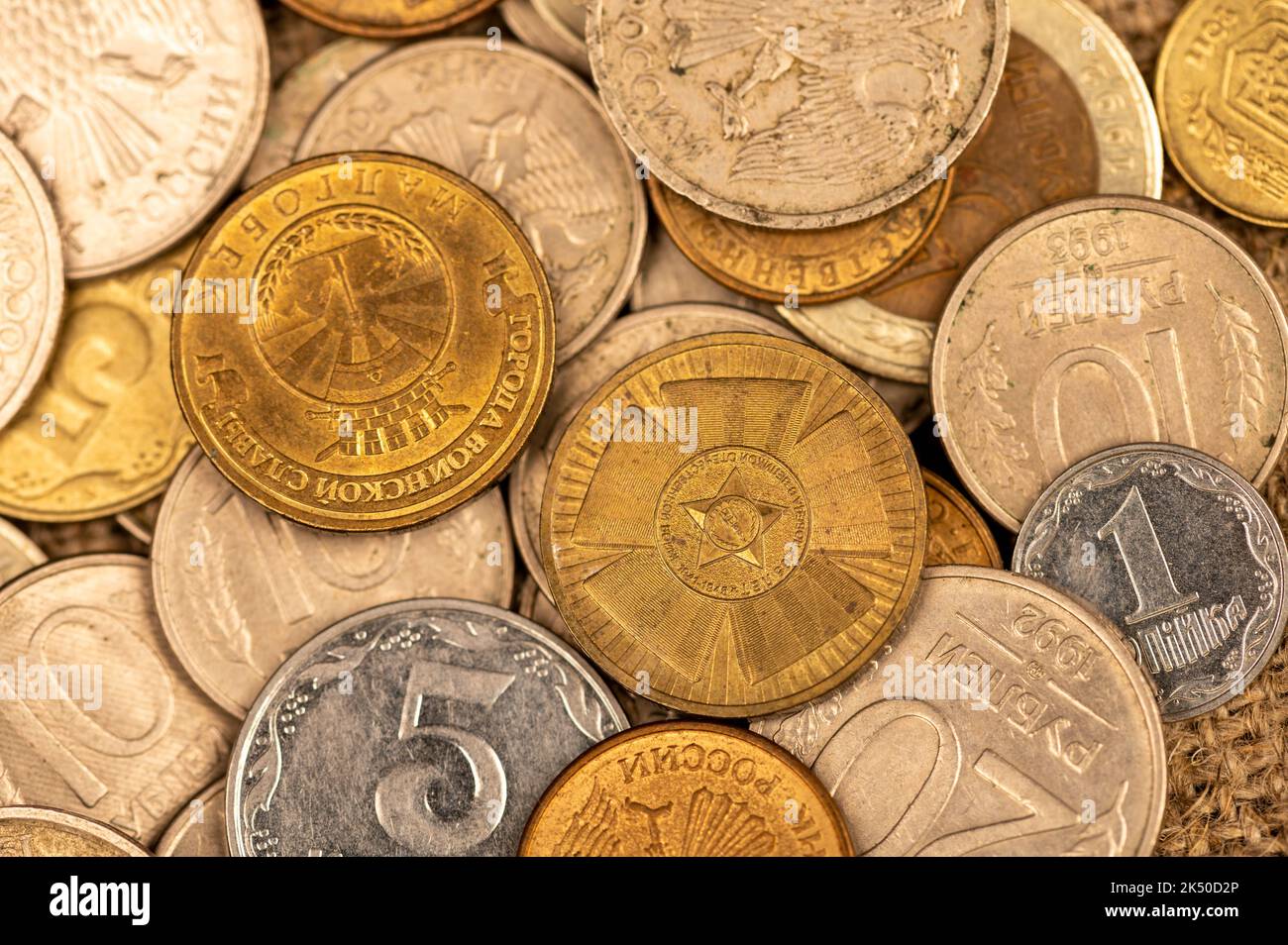 Old coins of the USSR in bulk on a flat surface, background image ...