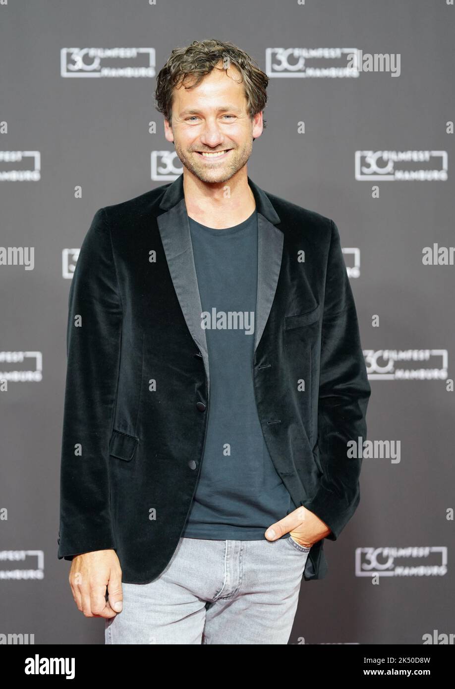 Hamburg, Germany. 04th Oct, 2022. Actor Florian Stetter stands on the ...