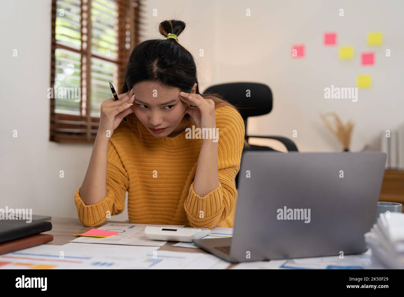 Portrait of stressed asian businesswoman in the office. burnout ...