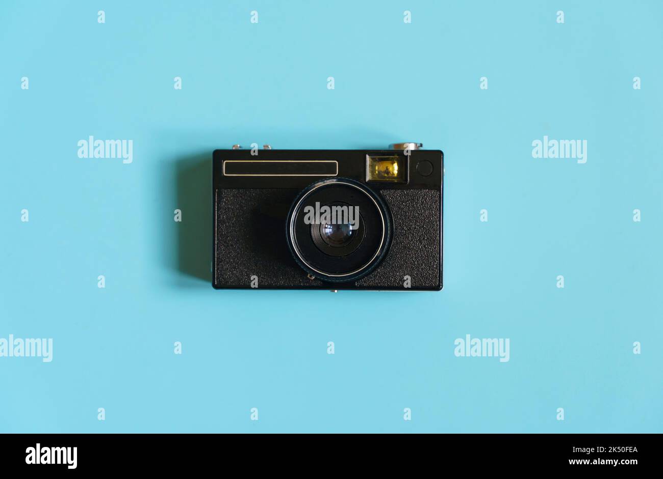 Film camera on a color minimal background. Photography, lifestyle ...