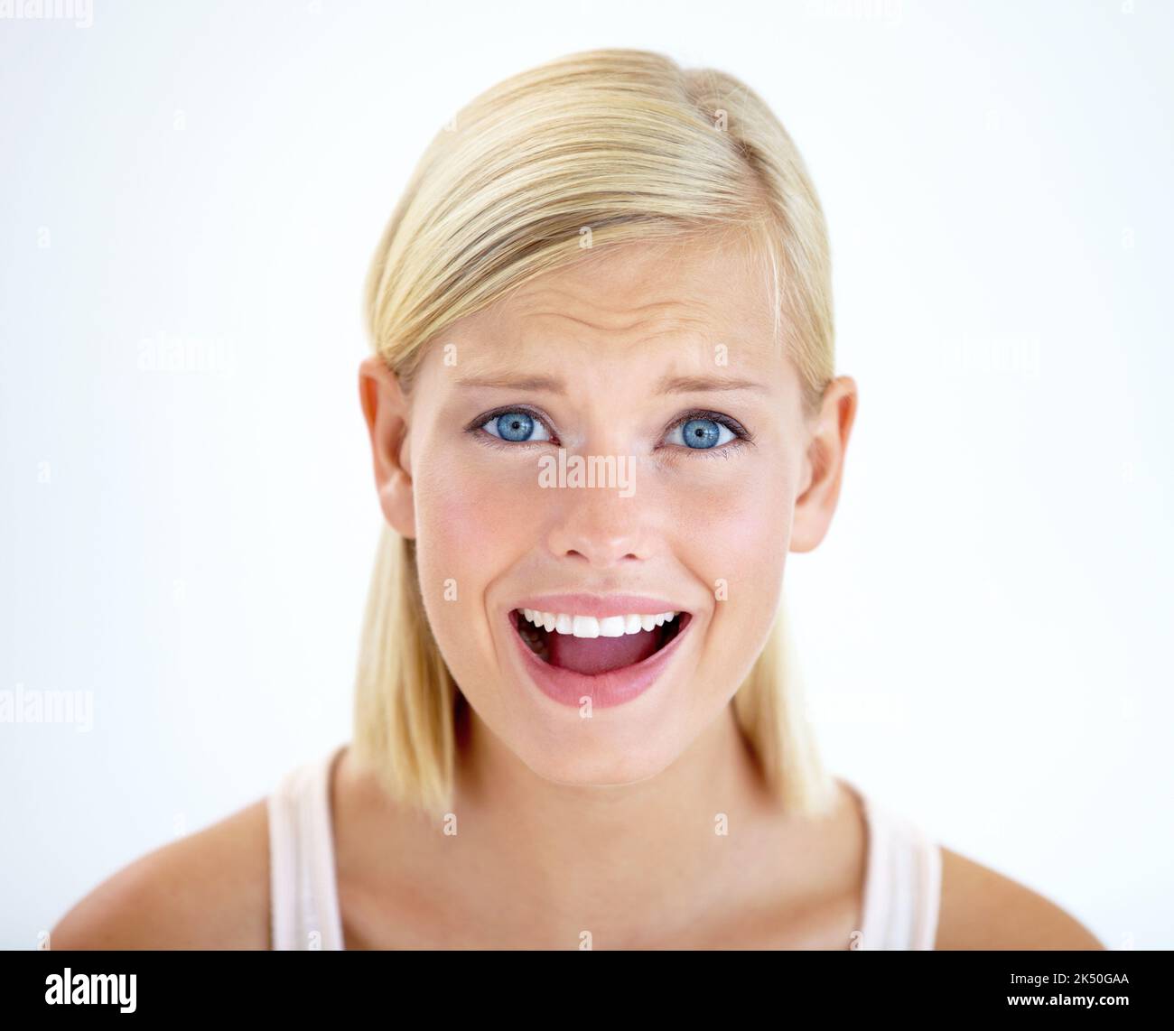 Beautiful young woman expressing shocked hi-res stock photography and ...
