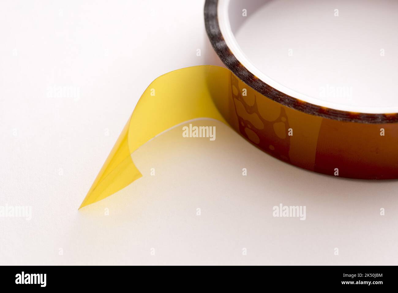 Closeup of roll of Kapton polyimide tape in spool with loose end Stock ...