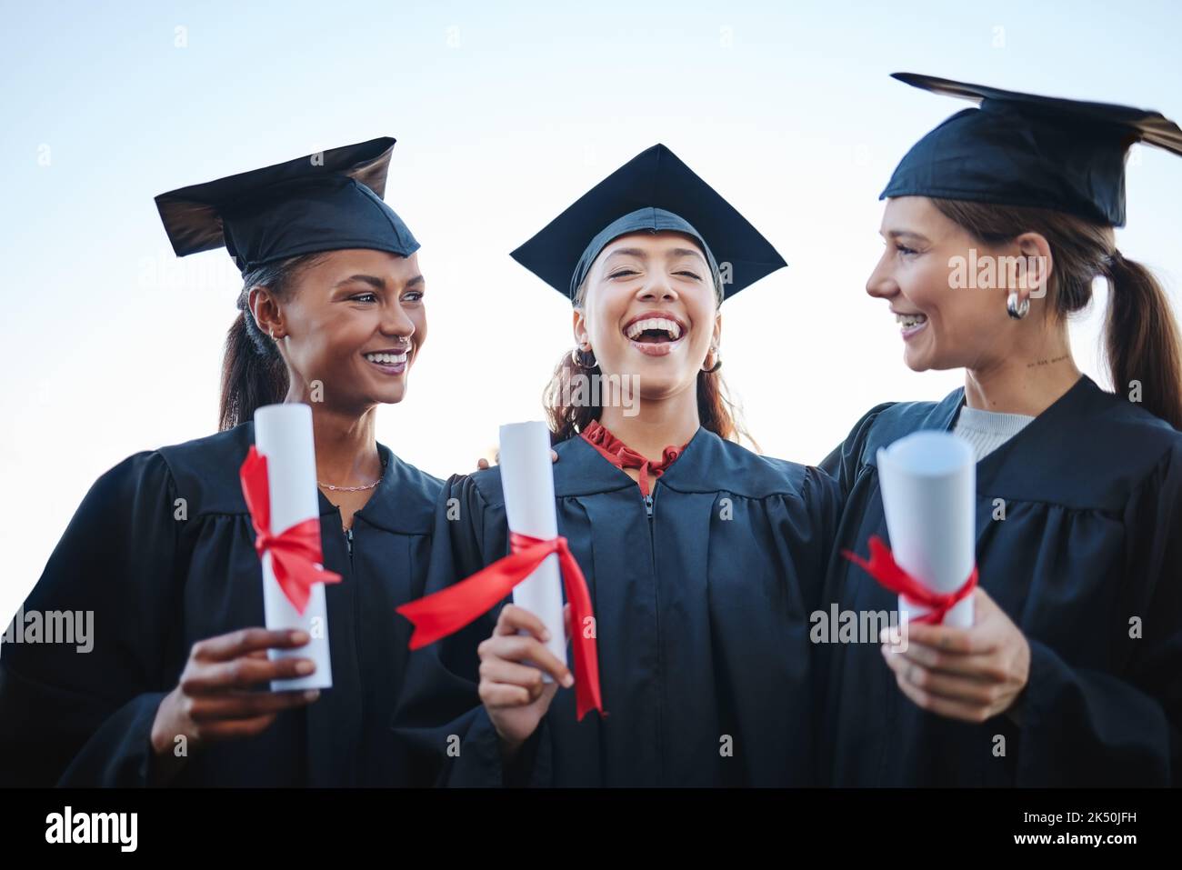 Graduation, students and friends laughing and celebrating at ceremony ...