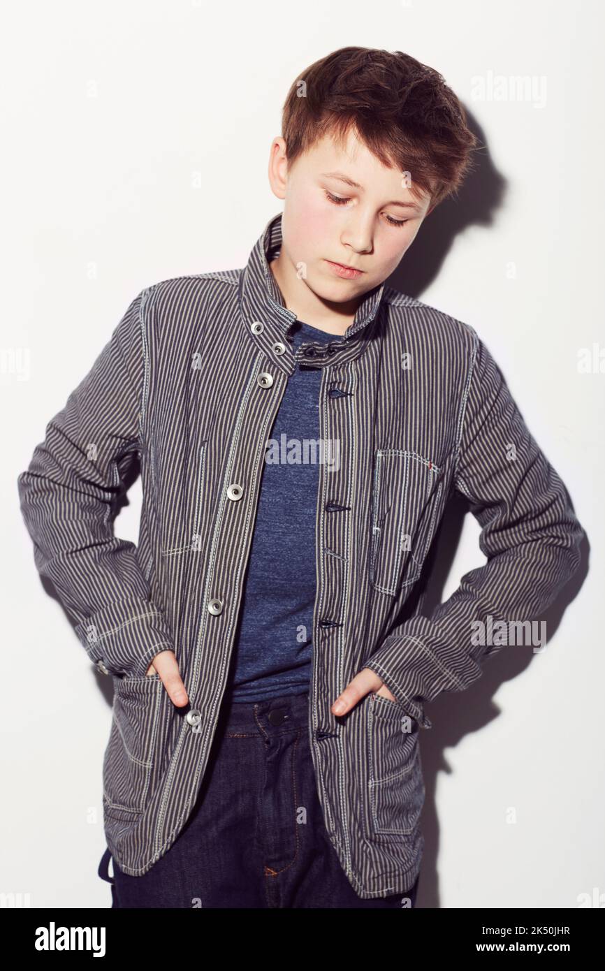 Teen boy looking down hi-res stock photography and images - Alamy