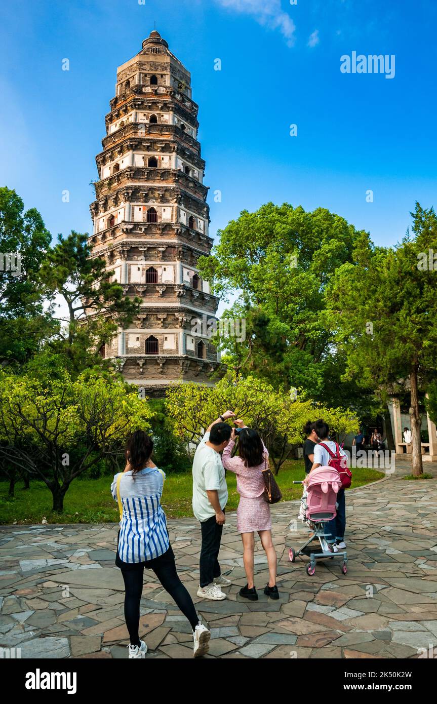 Tourists taking pictures at the Tiger Hill Pagoda also known as the ...