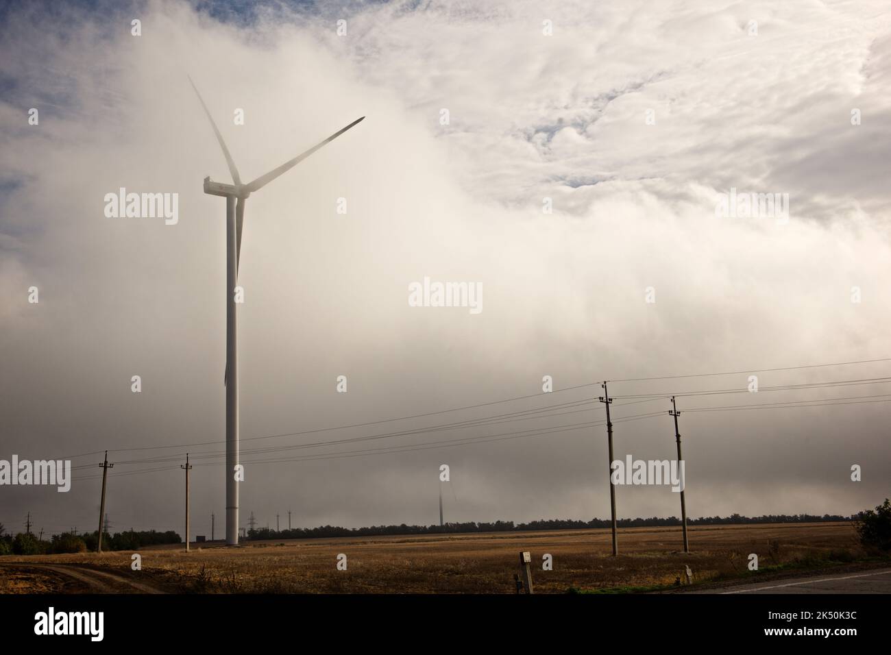 wind power plant, in the fog Stock Photo - Alamy