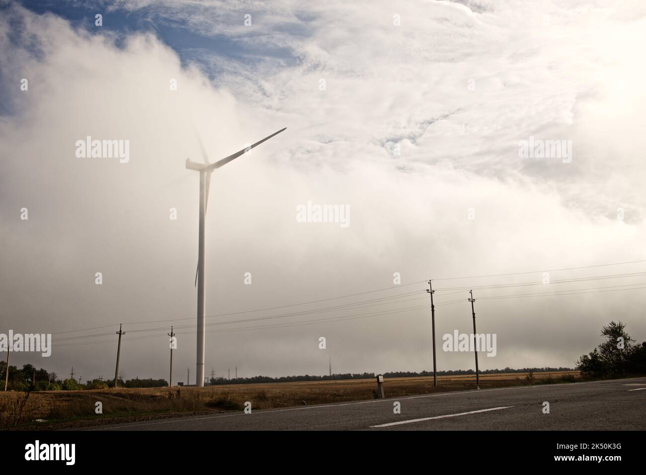 wind power plant, in the fog Stock Photo - Alamy