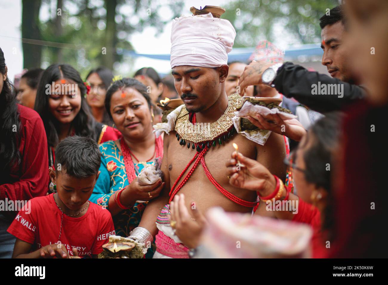 Bhaktapur, Nepal. 5th Oct, 2022. Nepalese Hindu devotees holds burning ...