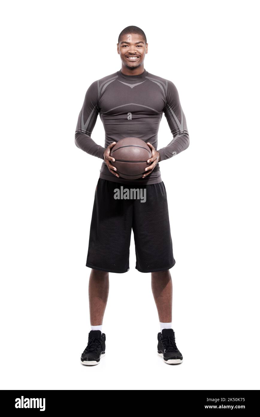 He has a passion for basketball. Portrait of a handsome young ...