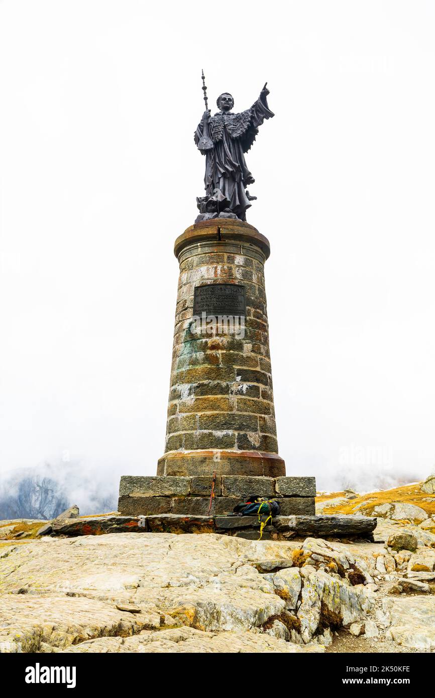 The bronze statue of St Bernard on a pedestal on the Italian side of ...