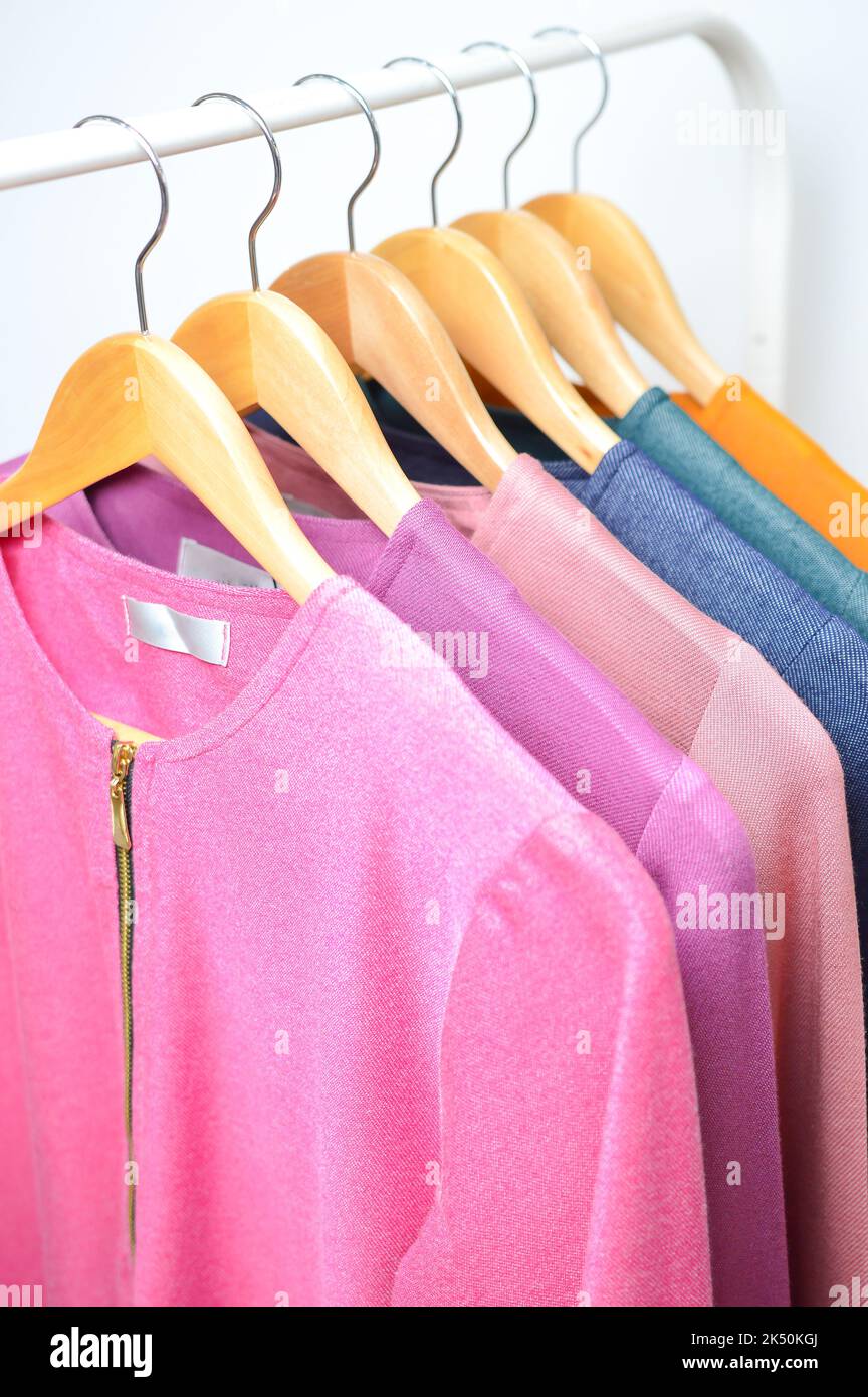 Colourful cloth for sale at the market isolated with white background ...