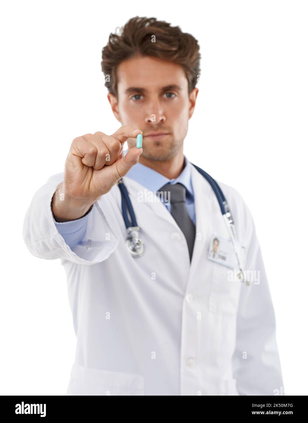 Take this two times daily. Studio shot of a serious-looking young ...