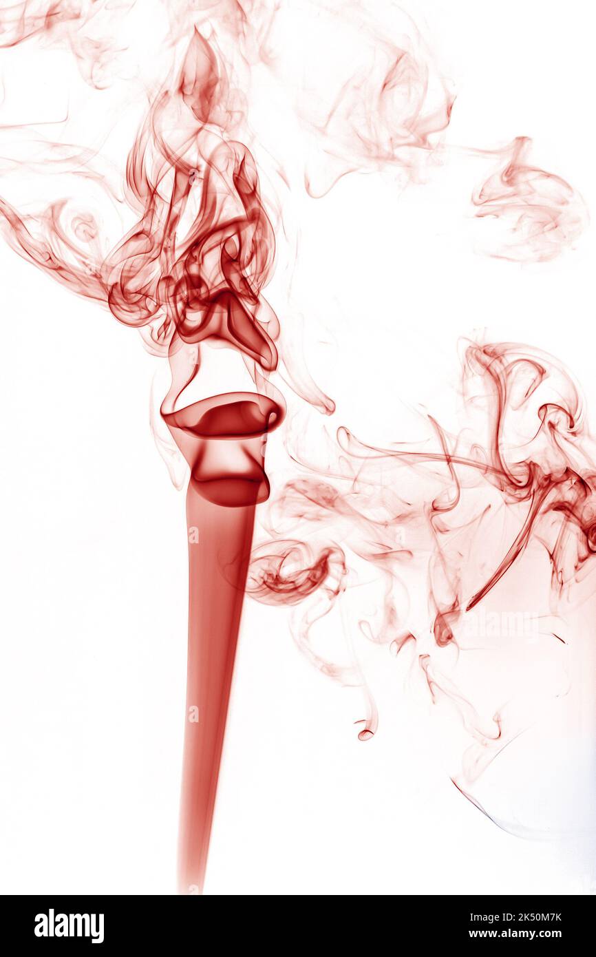 Red smoke on white background Stock Photo - Alamy