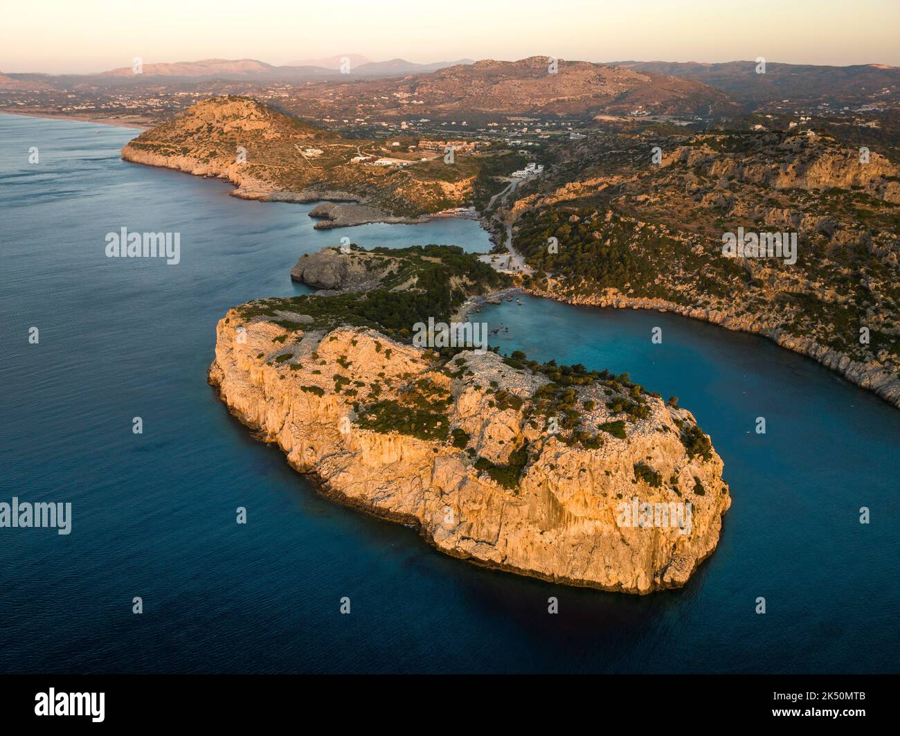 An aerial view of a landscape of giant cliffs surrounded by water Stock ...