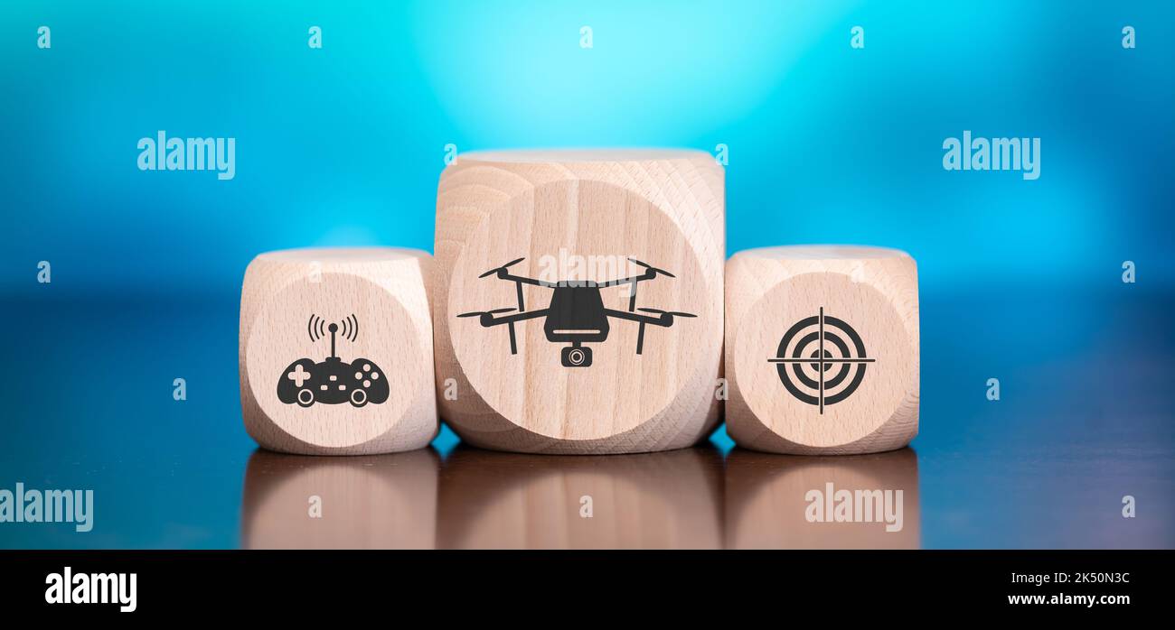 Wooden blocks with symbol of drone concept on blue background Stock ...