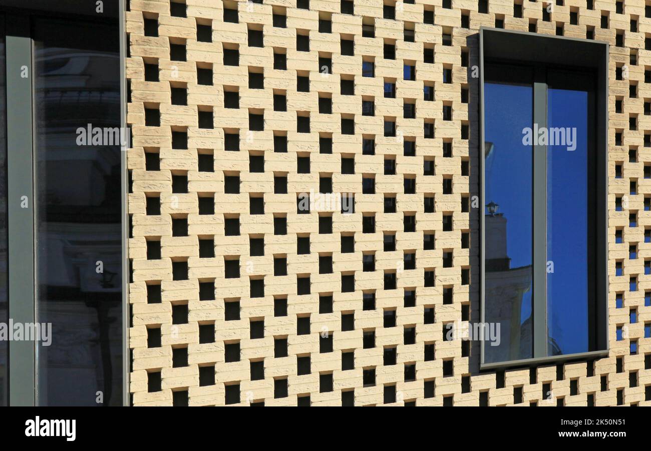 Windows of office building. Hinged and ventilated facade. Honeycomb and ...