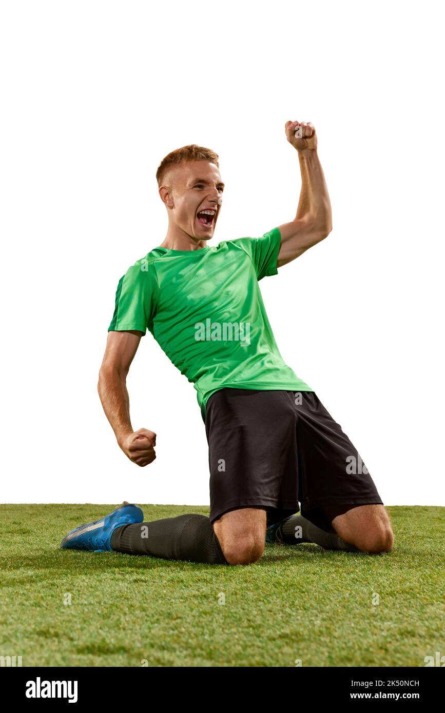 Excited football player shouting, expressing win emotions isolated over ...