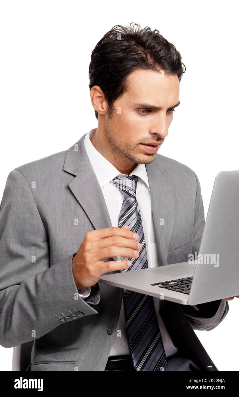 Somethings gone wrong. A focused young executive working on his laptop ... Somethings gone wrong. A focused young executive working on his laptop ...