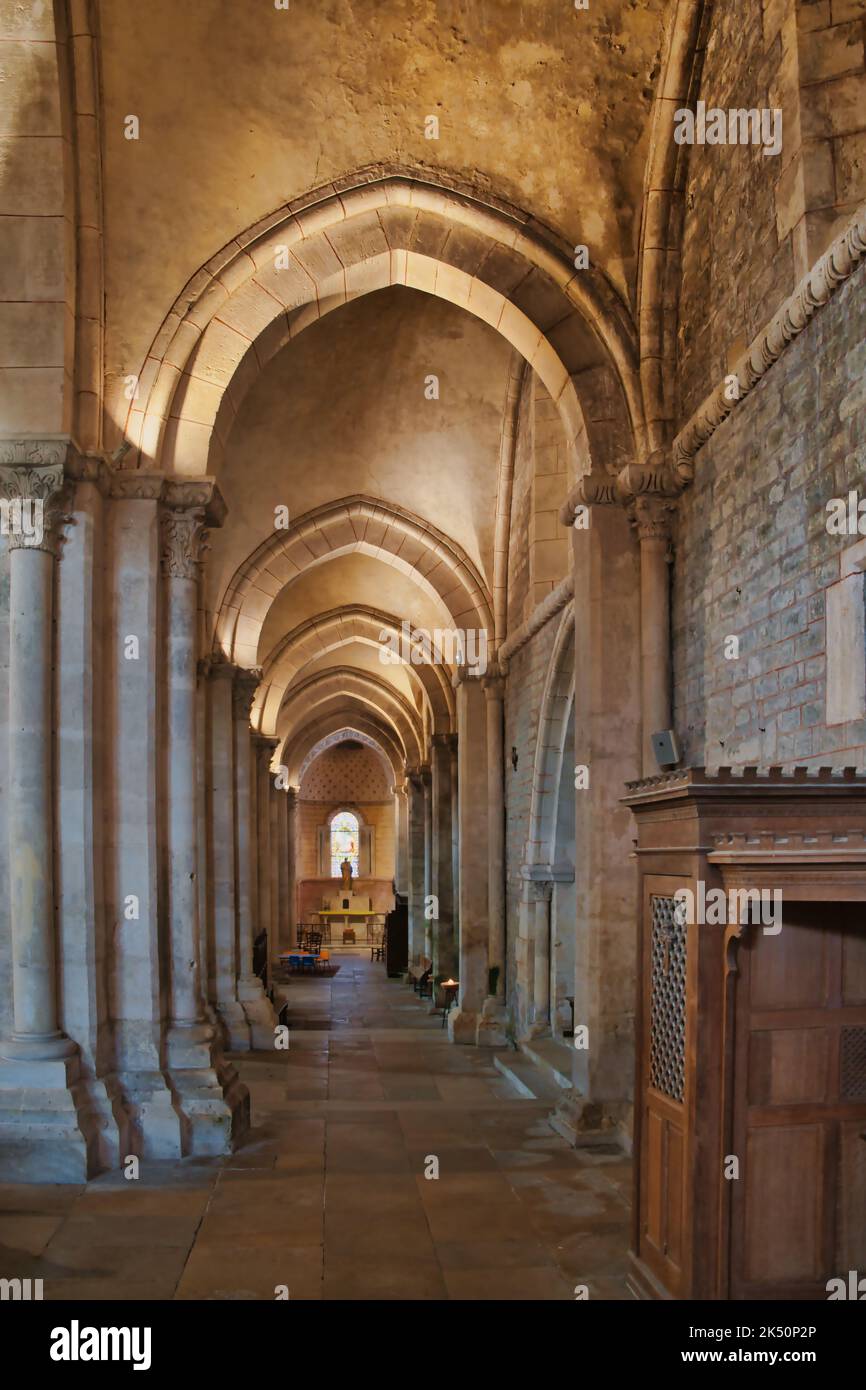 Side aisle with confessional in the medieval church of Notre Dame-Saint ...