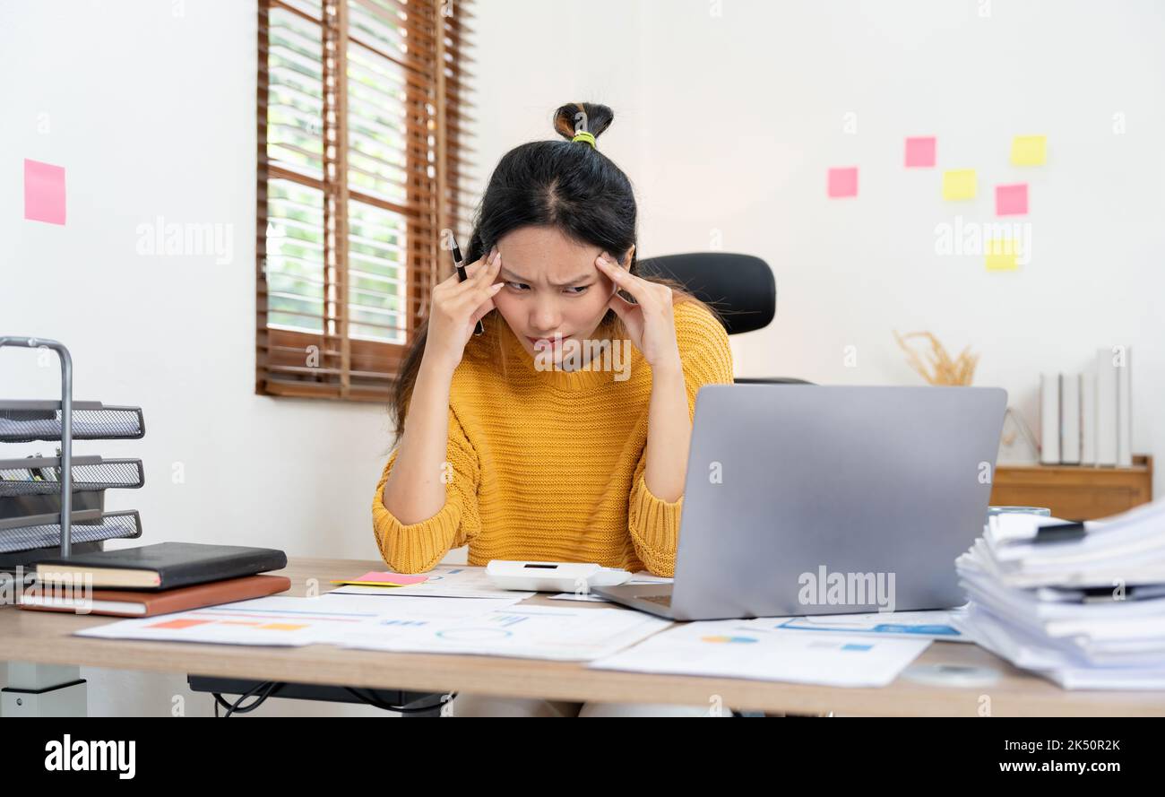 Bored workaholic accountant wmployee with Headache. stressed working ...