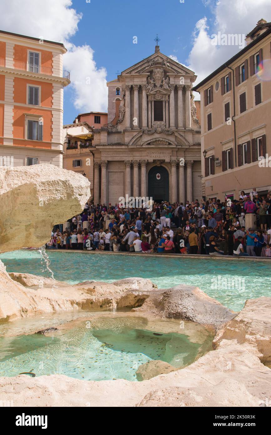 ROME, ITALY - OCTOBER 1, 2022: A group of people visit the Trevi ...