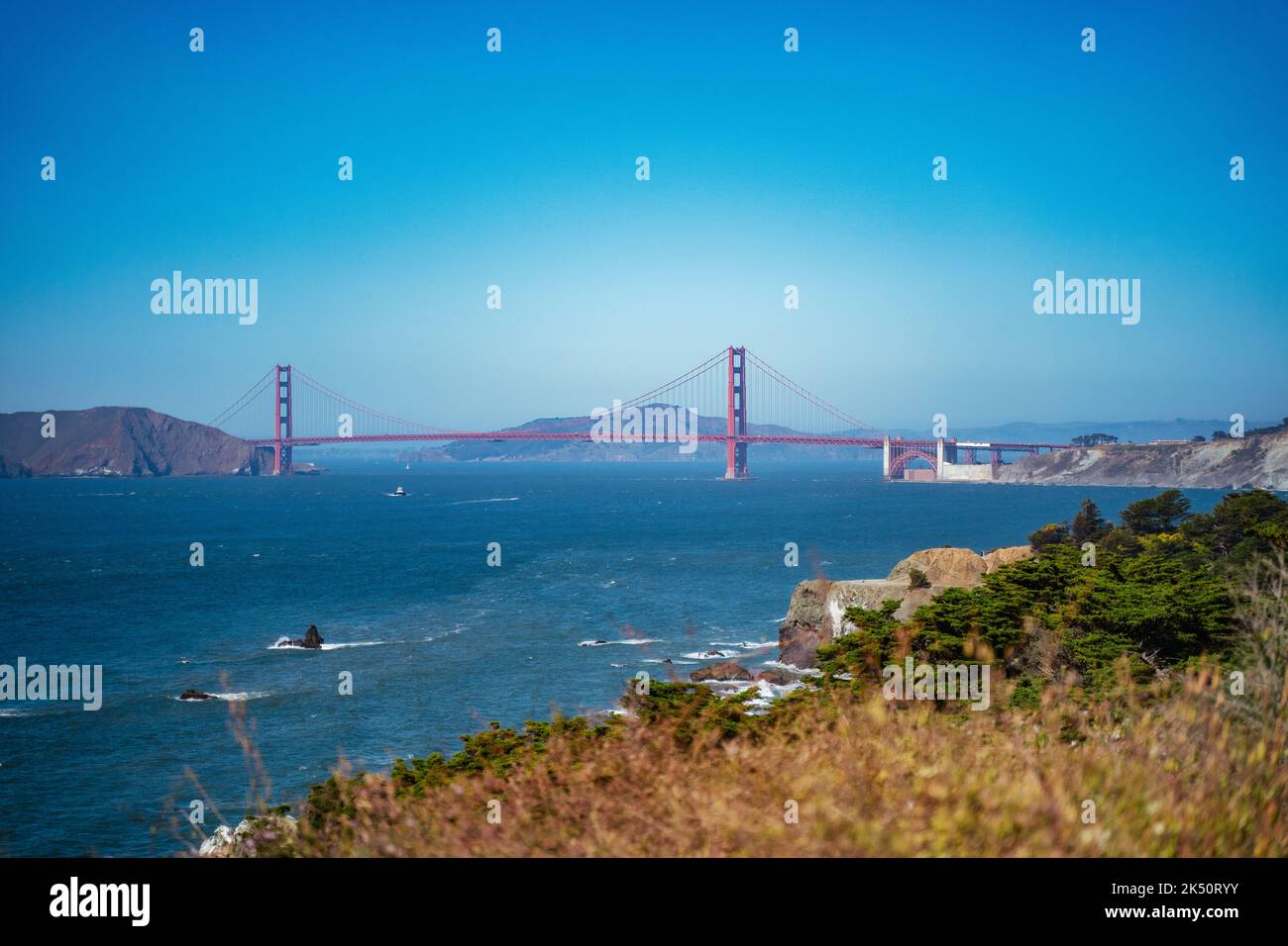 Golden gate bridge from lands end trail deadman's point on a bright ...