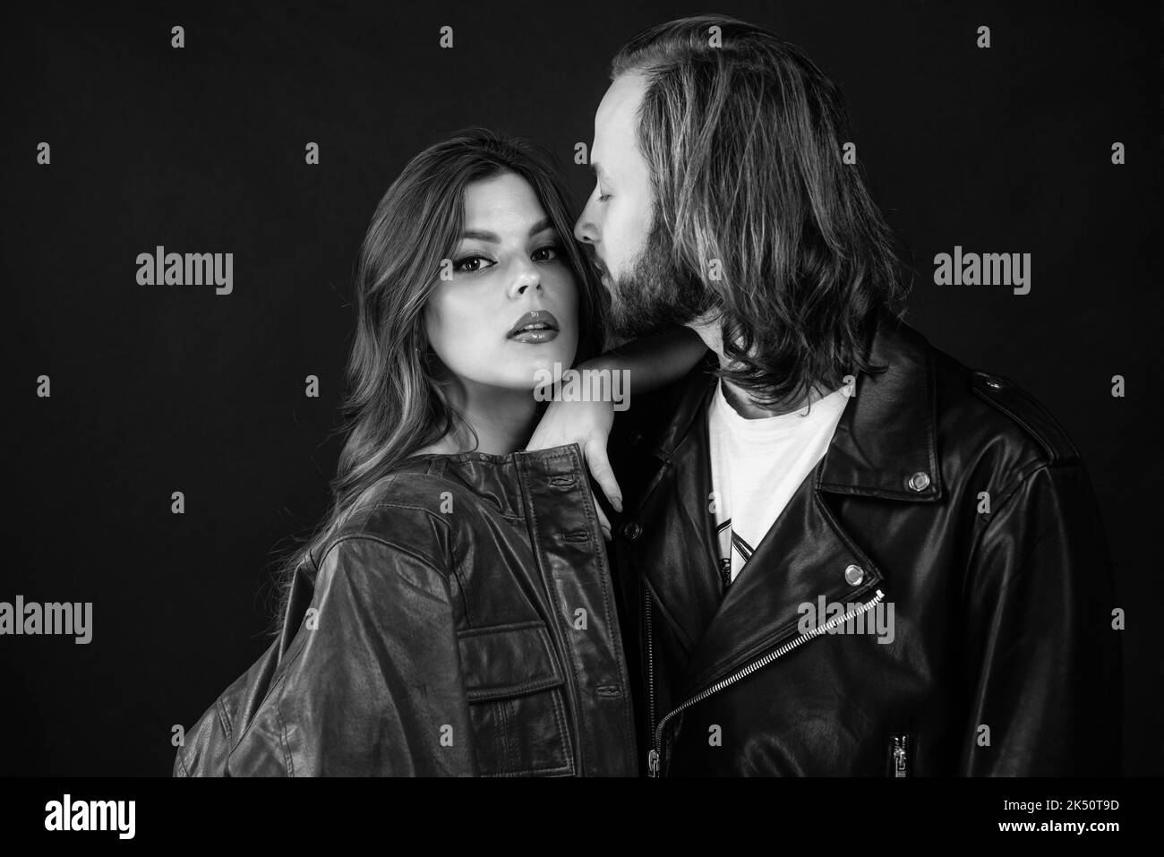 fashionable couple in leather jacket. bearded long hair man caress ...