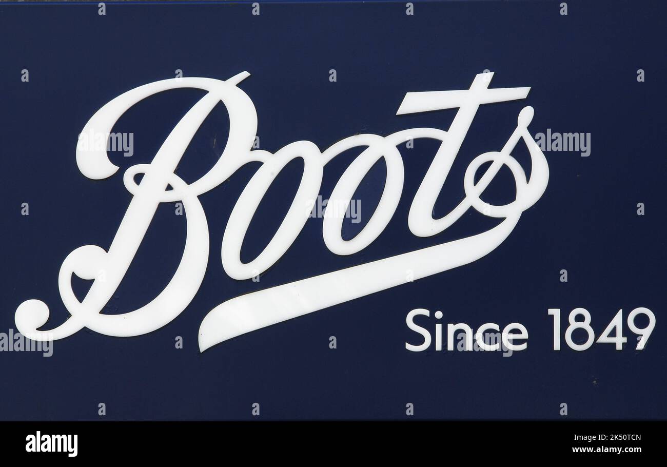Boots health and beauty store sign and trademark Stock Photo - Alamy