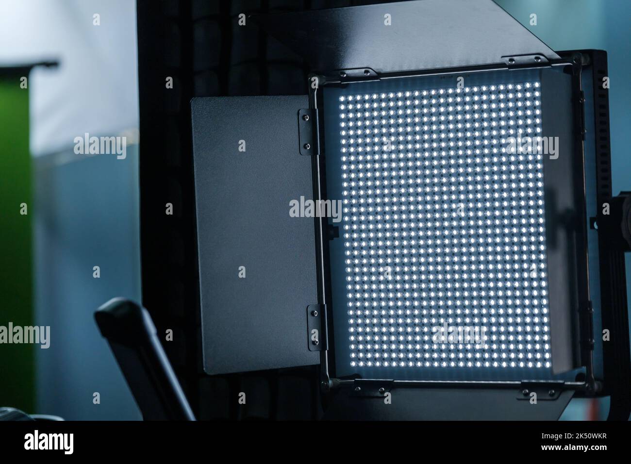 Modern studio lighting on metal tripod Stock Photo - Alamy