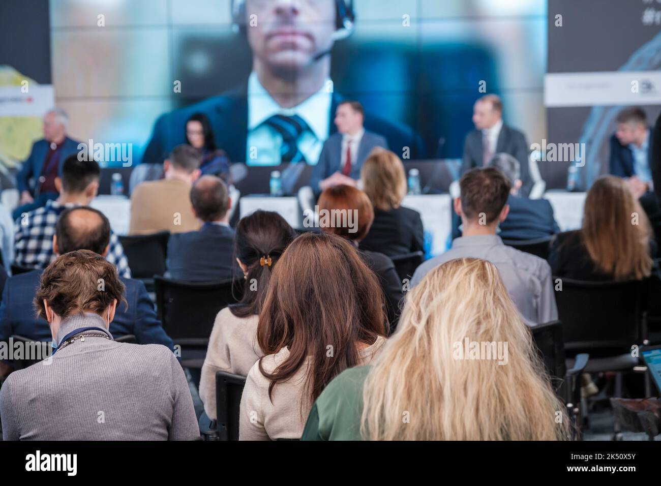 Anonymous business conference participants in hall Stock Photo - Alamy